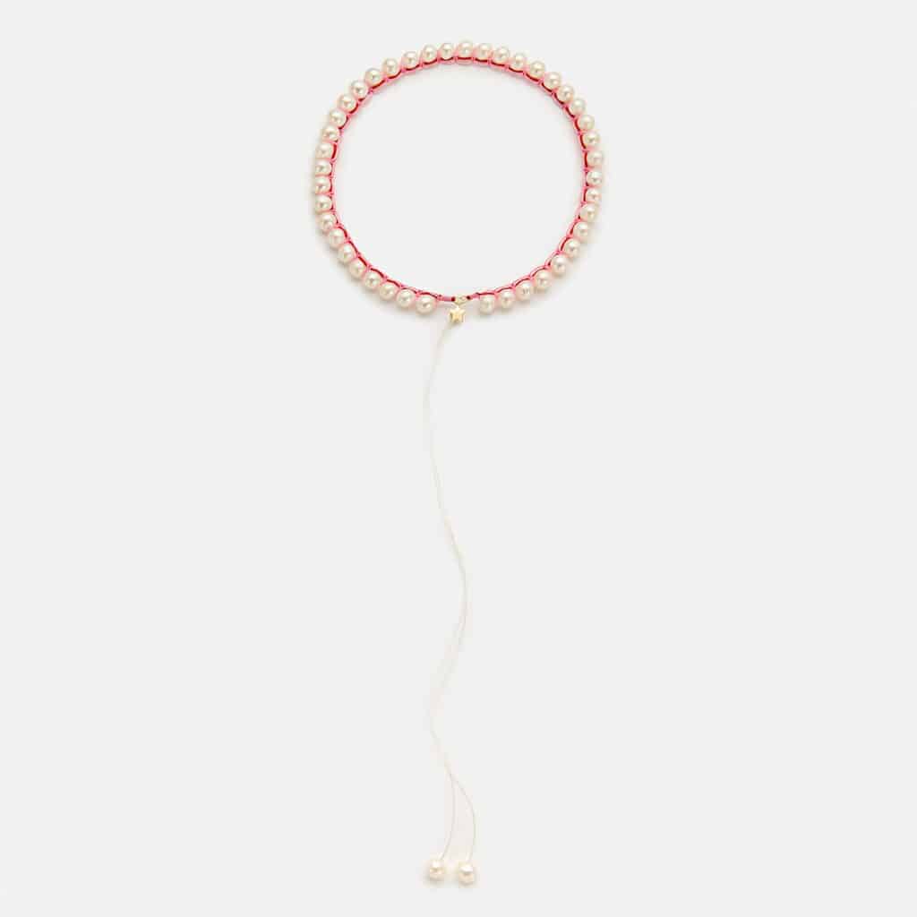 Embroidered large star gold colored "pulse" necklace with white ...